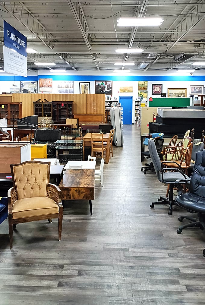 Furniture with character congregates in silent conversation, each piece whispering stories of past lives while awaiting new homes.