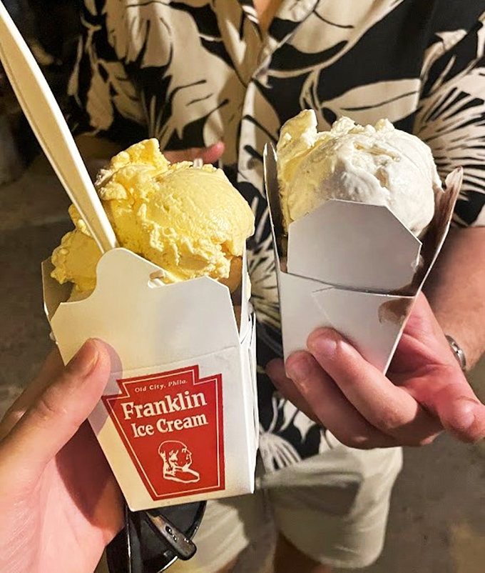 Simple pleasures in paper containers—proof that sometimes the best things come in small packages. That yellow scoop practically glows with buttery promise.