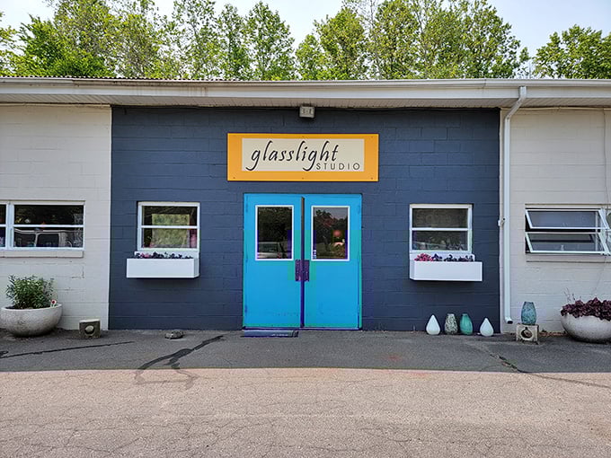 Glasslight Studio's vibrant blue doors promise artistic treasures within. It's like finding Tiffany's in Mayberry&mdash;unexpected but perfectly placed.