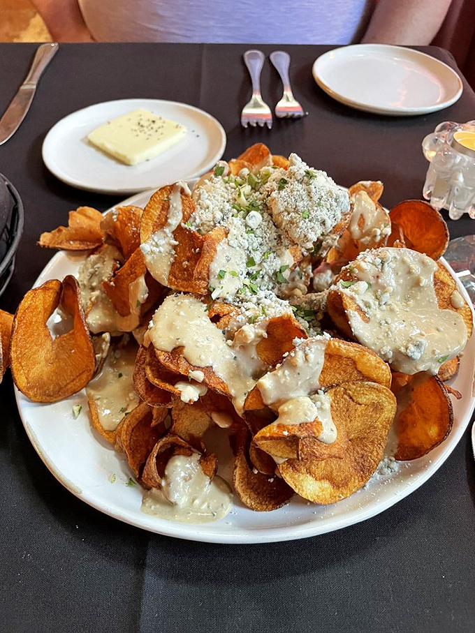 Potato chips gone to heaven! These gorgonzola-smothered crisps are what would happen if a steakhouse and a late-night snack had a beautiful baby.