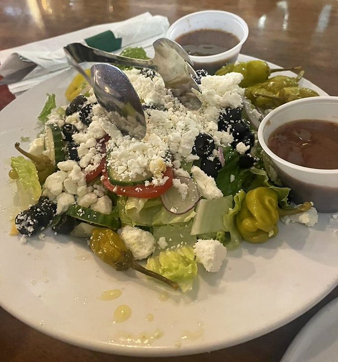 This isn't just a Greek salad&mdash;it's a Mediterranean vacation on a plate. Feta crumbles like little clouds over crisp vegetables and briny olives.