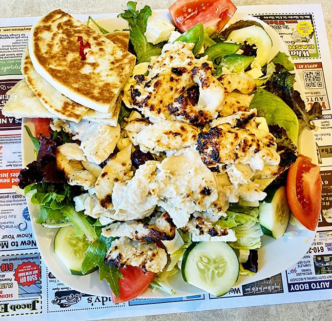 A Greek salad that proves vegetables can be more than just an obligation. That grilled chicken looks like it's auditioning for a starring role in your memory.