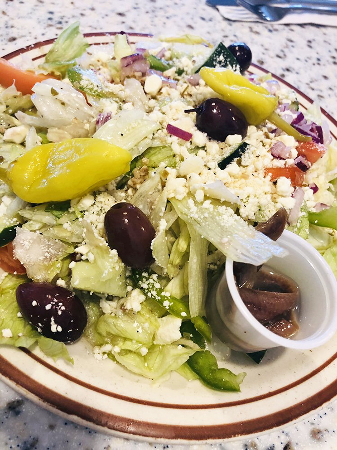 A Greek salad that transports you straight to the Mediterranean&mdash;crisp, colorful, and crowned with feta that means business.