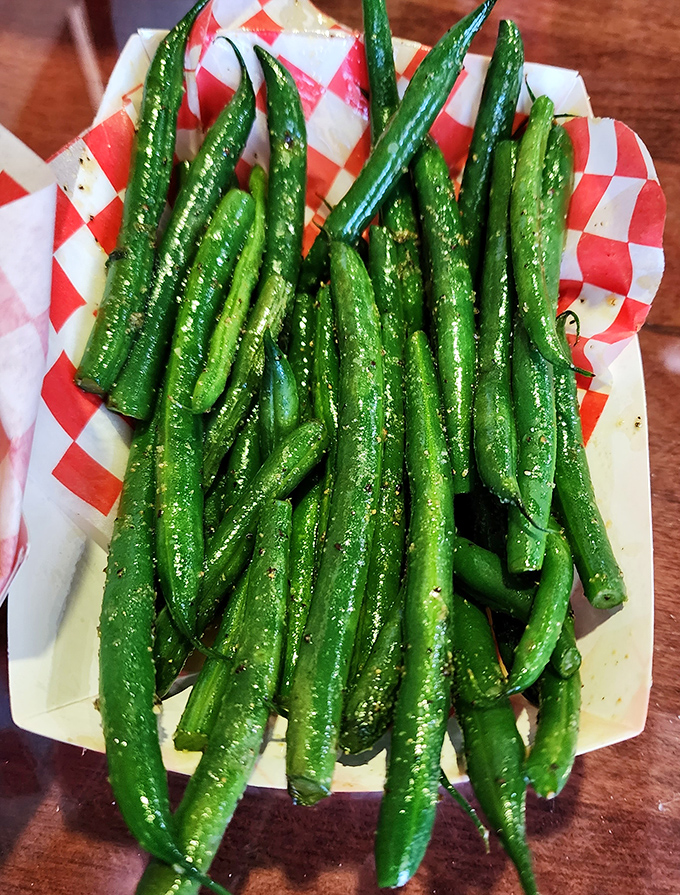 Green beans that haven't been cooked into submission &ndash; a refreshing counterpoint to the meat parade. Your mother would approve of this vegetable choice.