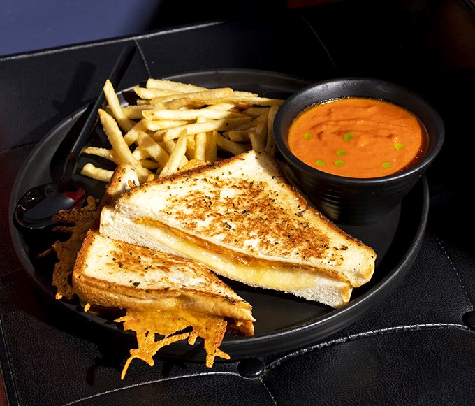 Grilled cheese and tomato soup: childhood comfort with grown-up execution. Like finding your favorite teddy bear, but now he's got a PhD.