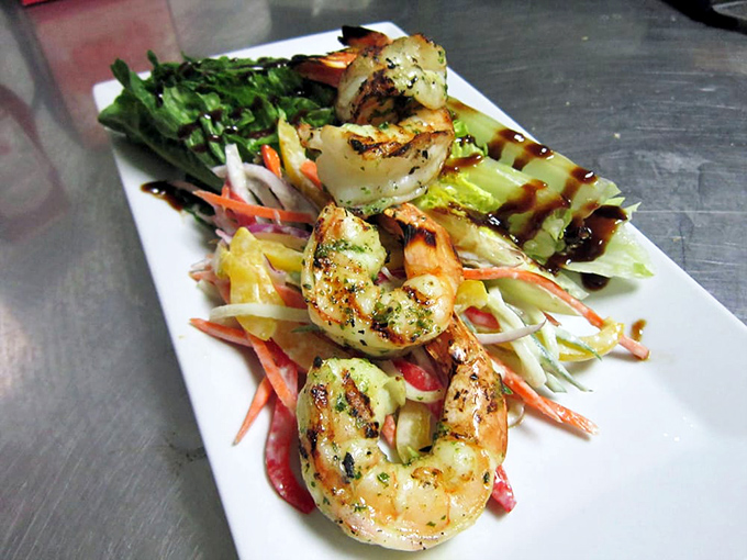 These grilled shrimp haven't just been cooked&mdash;they've been respected, nestled atop a rainbow of vegetables that crunch with each bite.