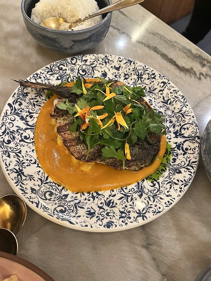 Fish this beautiful deserves its own Instagram account. The vibrant sauce creates a sunset backdrop for the perfectly seared protein star of the show.