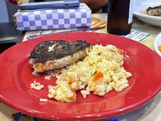 Perfectly blackened fish meets creamy risotto &ndash; a plate that would make both fishermen and fancy chefs nod in respectful approval.