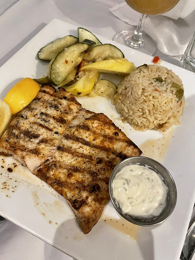 Grilled mahi-mahi that's actually moist&mdash;a Florida miracle&mdash;served with seasonal vegetables and rice that's absorbed just enough flavor to be interesting on its own.