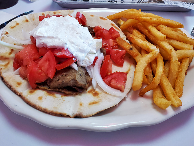 Mediterranean meets Main Street in this Greek-inspired creation. Fresh tomatoes, tzatziki, and seasoned meat wrapped in warm pita&mdash;a vacation for your taste buds.