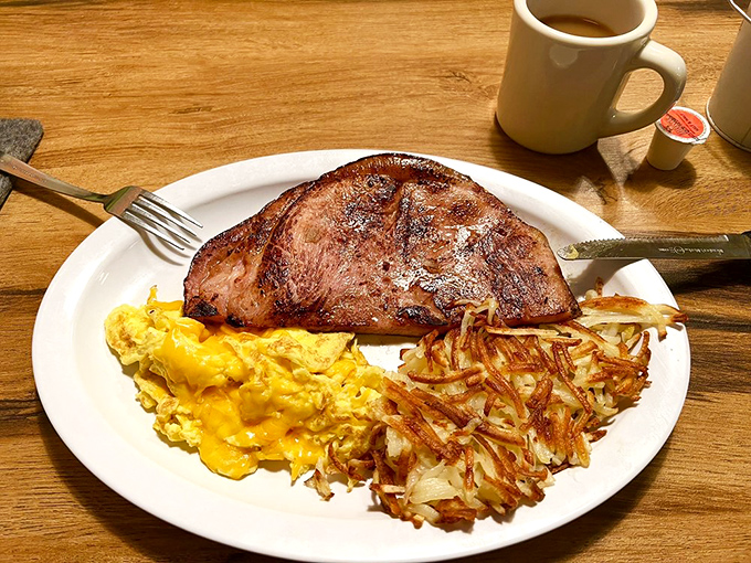 This pork chop with eggs and hash browns isn't just breakfast &ndash; it's a declaration that today is going to be an excellent day.