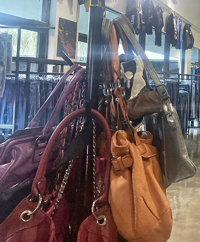 Handbag heaven hanging in plain sight &ndash; designer dreams at prices that won't require explaining mysterious charges to your spouse.
