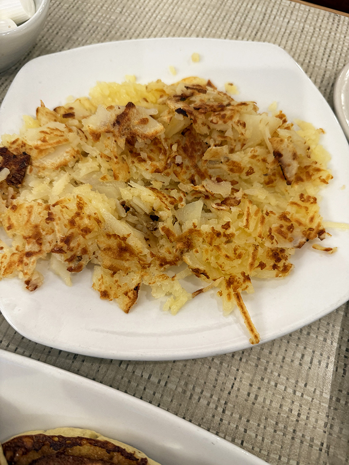 These hash browns achieved the impossible dream &ndash; crispy exterior, tender interior, and enough golden-brown goodness to make a potato proud of its life choices.