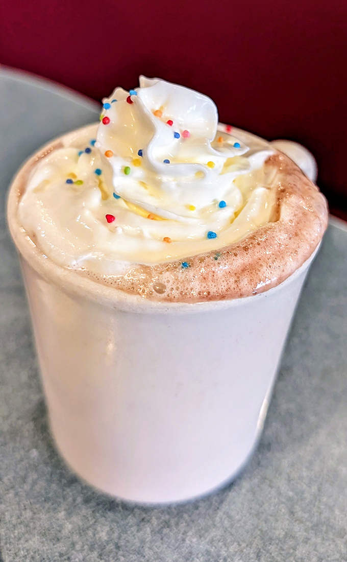 Hot chocolate that doesn't just warm your hands but hugs your soul&mdash;topped with a cloud of whipped cream that defies gravity.