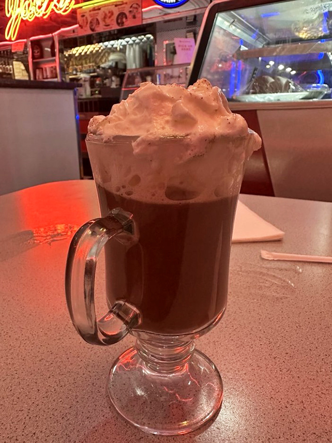 Hot chocolate that doesn't know when to quit &ndash; topped with a cloud of whipped cream that makes Swiss Alps look like speed bumps.