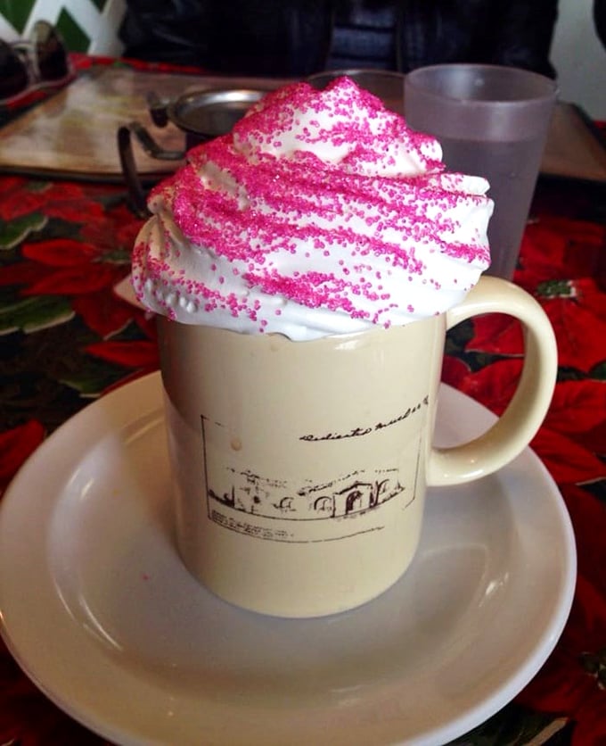 Hot chocolate that wears a pink crown of whipped cream&mdash;because sometimes your beverage deserves to dress fancy too.
