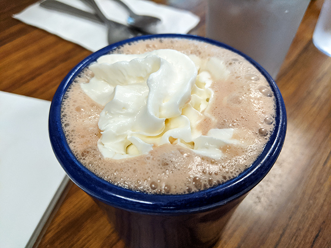 Hot chocolate that understands the Seattle weather. That mountain of whipped cream isn't excessive&mdash;it's necessary emotional support.