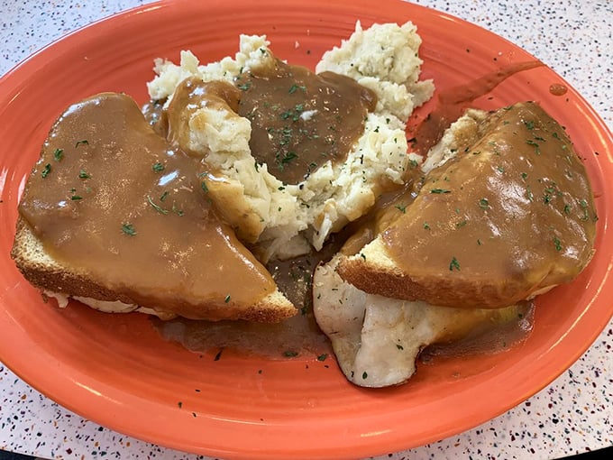 Comfort food doesn't get more comforting than this hot turkey sandwich&mdash;bread islands in a gravy sea with mashed potato mountains. Thanksgiving without the family drama! 