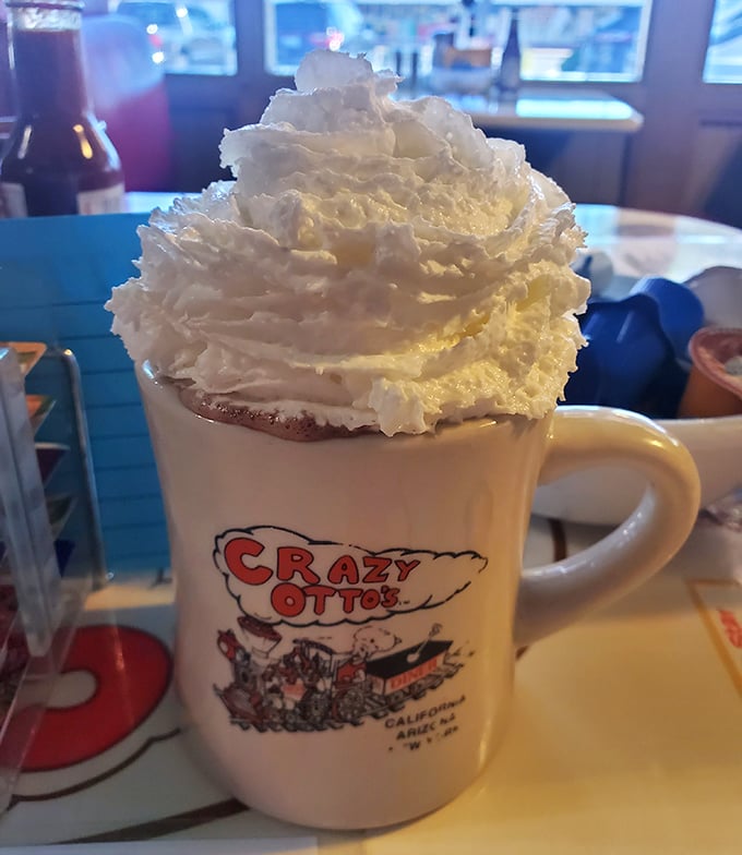 That's not just hot chocolate&mdash;that's a cloud of whipped cream performing a balancing act on a mug of liquid comfort.