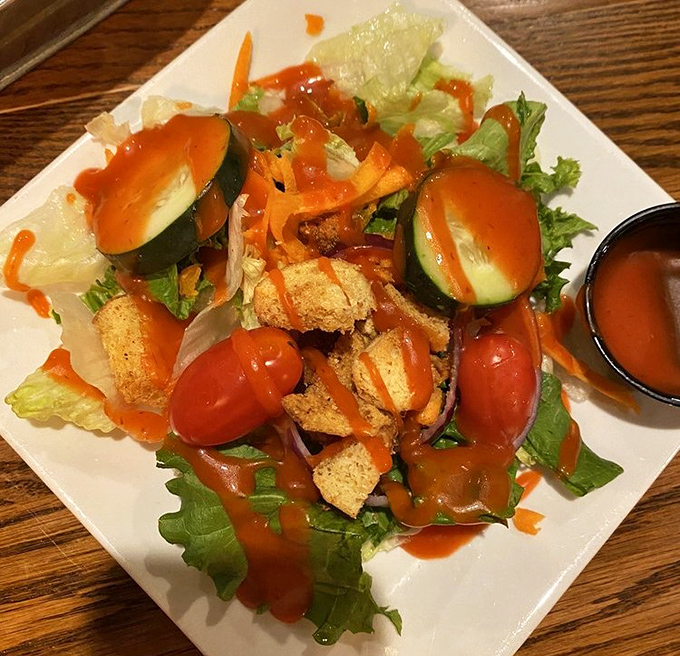 Even the house salad gets the coastal treatment—proof that Marblehead knows vegetables are more than just garnish for seafood.