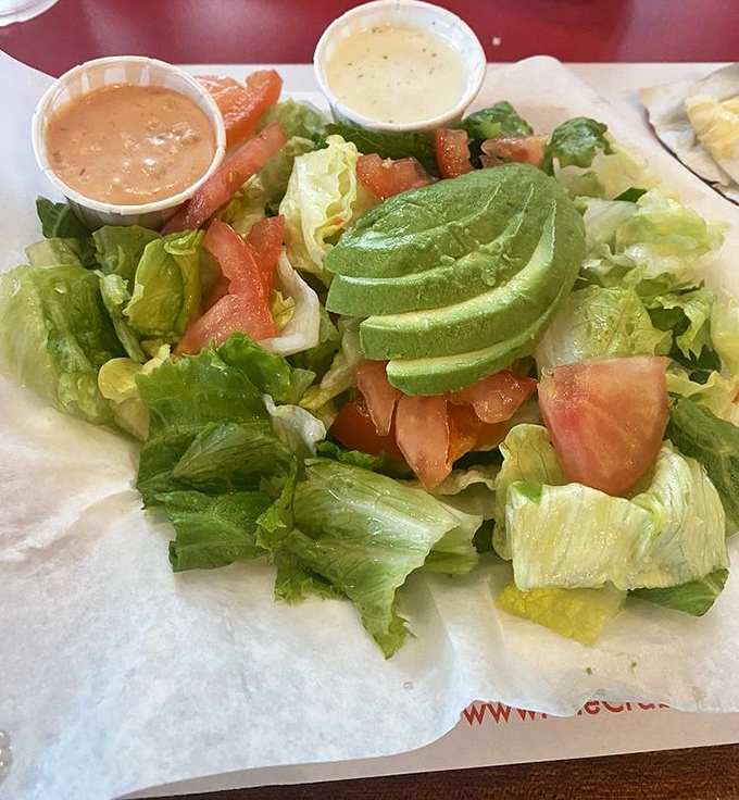 Even the salad gets the star treatment &ndash; fresh, vibrant, and adorned with avocado slices that could only be this perfect in California. A refreshing counterpoint to seafood richness.