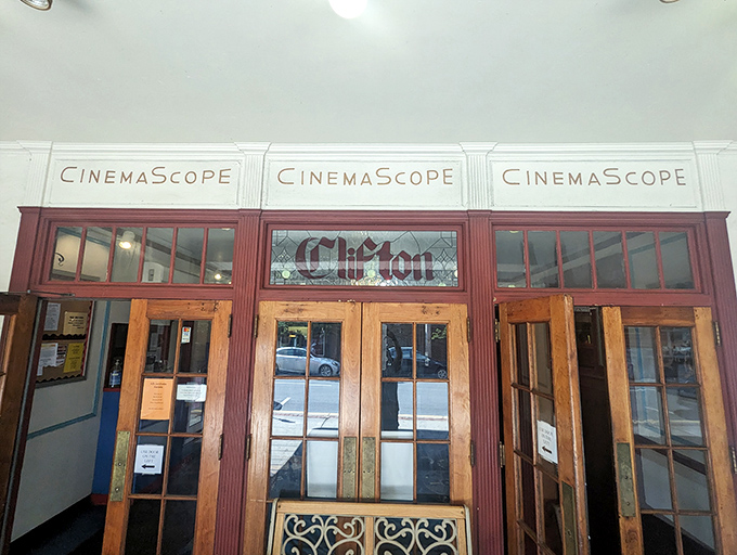 The Clifton 5 Cinema's vintage entrance whispers of first dates and Saturday matinees, a portal to both Hollywood magic and simpler times.