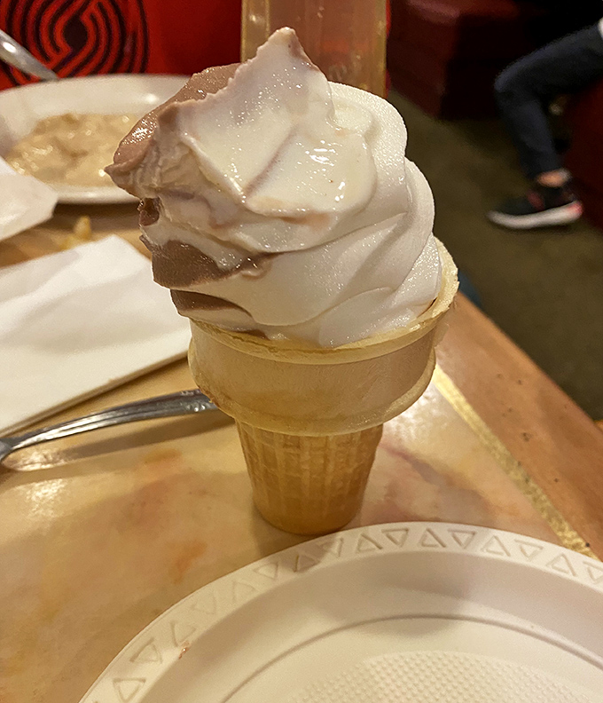 The humble ice cream cone&mdash;that perfect finale to a buffet marathon&mdash;swirled high with vanilla and chocolate in defiance of all fullness warnings.