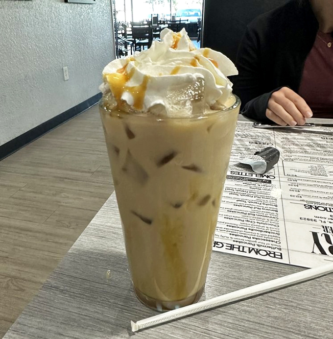 Coffee elevated to dessert status with caramel, whipped cream, and enough caffeine to jumpstart your day. Liquid motivation in a glass.