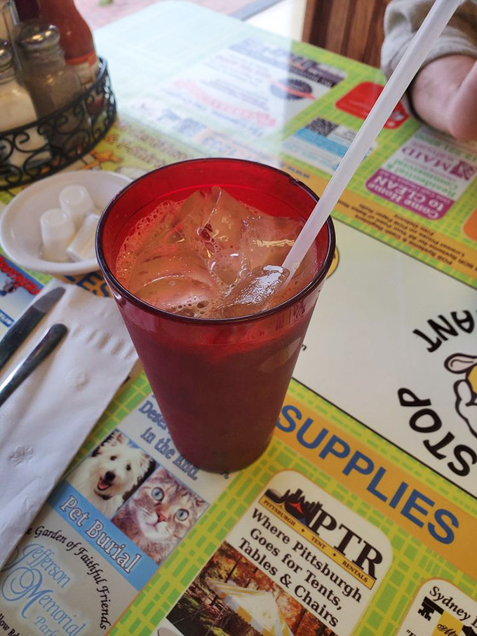 That ruby-red iced tea isn't just a beverage; it's the perfect supporting actor in your breakfast theater production.