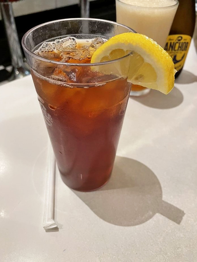 Even the iced tea gets the star treatment&mdash;amber liquid in a tall glass with a lemon wedge. Simple pleasures done right.