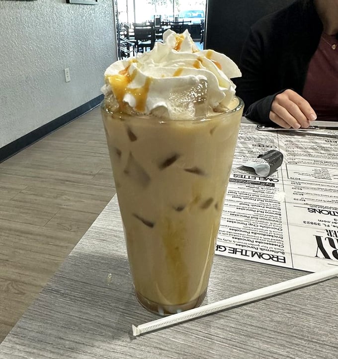 This isn't just iced coffee &ndash; it's a caffeinated masterpiece topped with enough whipped cream to make your diet plan file for divorce.