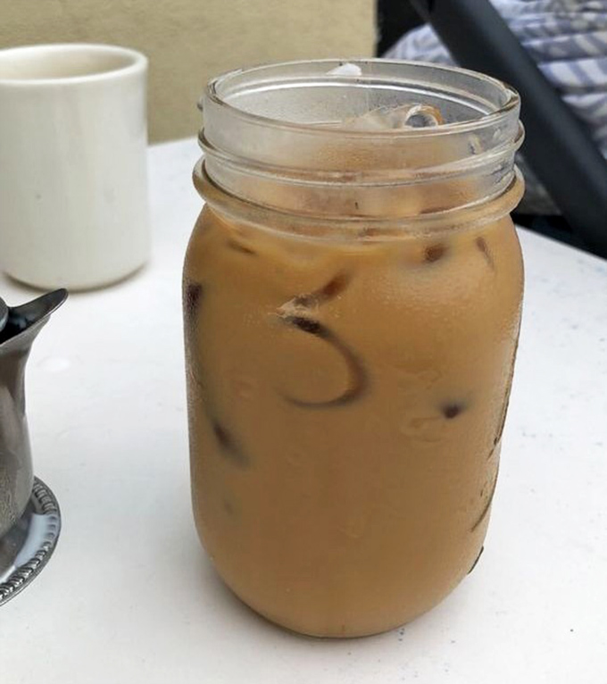 Mason jar iced coffee: because sometimes caffeine tastes better when served with a side of hipster nostalgia. Simple, strong, and ready for Instagram.
