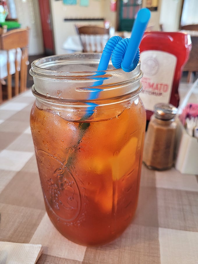 Sweet tea served in a Mason jar&mdash;because drinking from regular glasses is just too fancy for this delightfully unpretentious establishment.