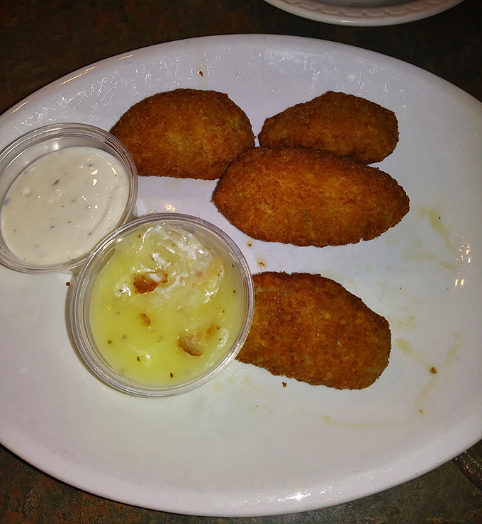 These golden-brown jalape&ntilde;o poppers aren't just appetizers; they're little capsules of joy that make waiting for your main course a pleasure, not a chore.