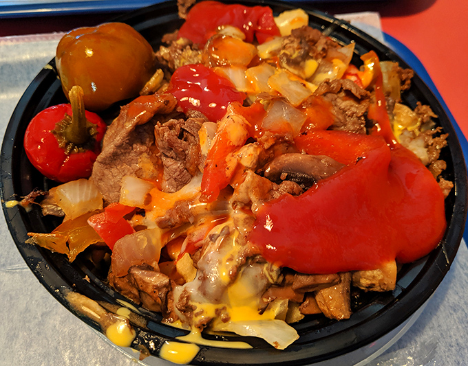 Joe's Special – where peppers, onions, and cheese perform a beautiful dance atop seasoned beef. A flavor fiesta in every bite.