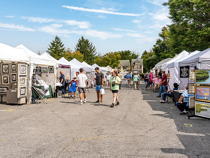 The Kennett Square Arts Festival transforms parking lots into galleries, proving that creativity blooms just as abundantly as the town's famous mushrooms.
