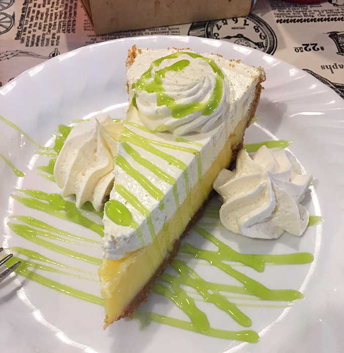 Key lime pie wearing its meringue like a party hat, ready to make your taste buds do the cha-cha.