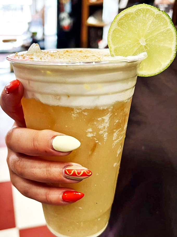 A drink that can't decide if it's dessert or refreshment. This Key Lime Pie Red Bull creation is what happens when bartenders get breakfast privileges.