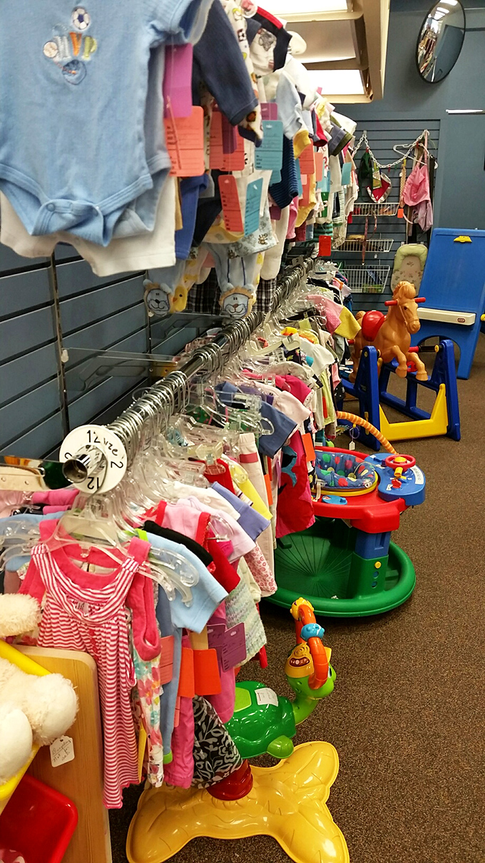 Tiny treasures for tiny humans line the walls, while colorful activity centers wait patiently below. Future yard sale items in training, but adorable nonetheless.