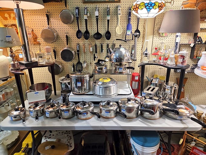 Stainless steel pots and pans that have likely witnessed thousands of family dinners, holiday feasts, and late-night cookie baking sessions throughout the decades.