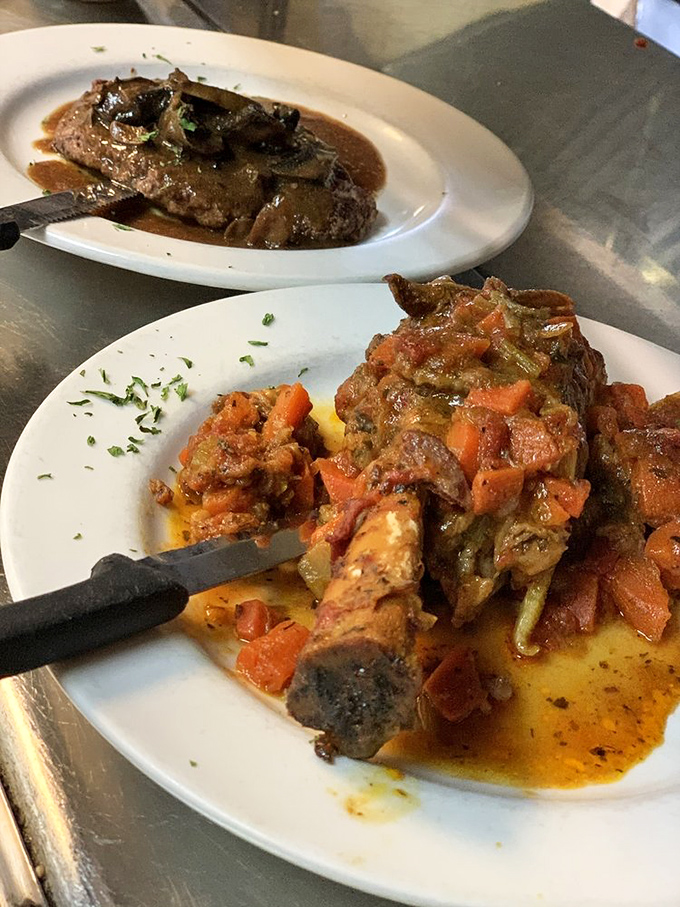 The legendary lamb shank, swimming in a sauce worth bottling and taking home. Fall-apart tender meat that makes you wonder why you'd ever order anything else.