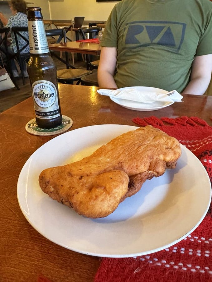 A German pilsner alongside what appears to be langosh&mdash;fried dough that's like the Eastern European cousin to funnel cake, only better.