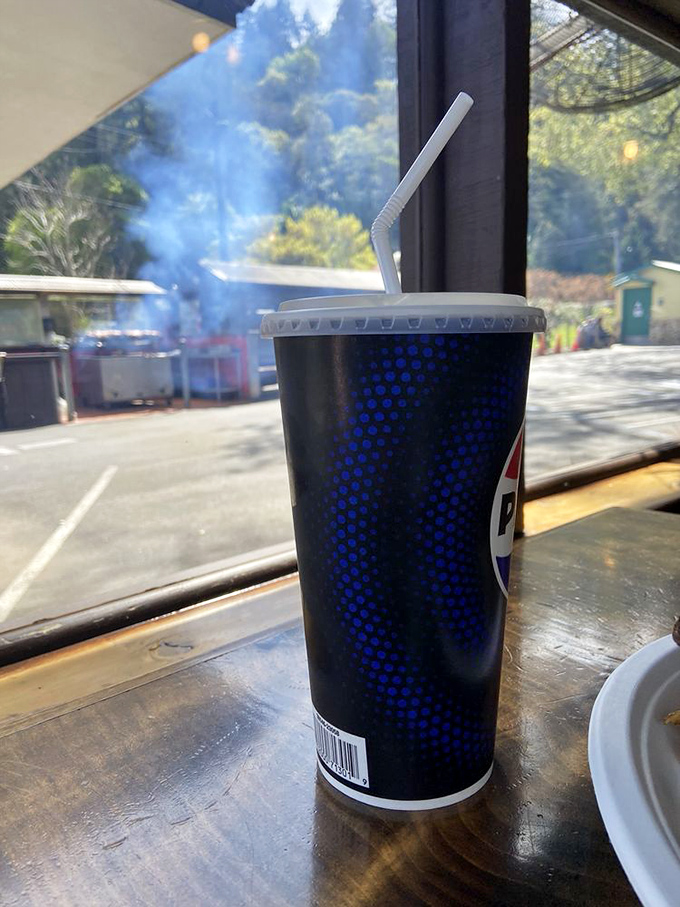 Through that window, you can see smoke rising from the grills outside &ndash; visual evidence that good things come to those willing to wait.