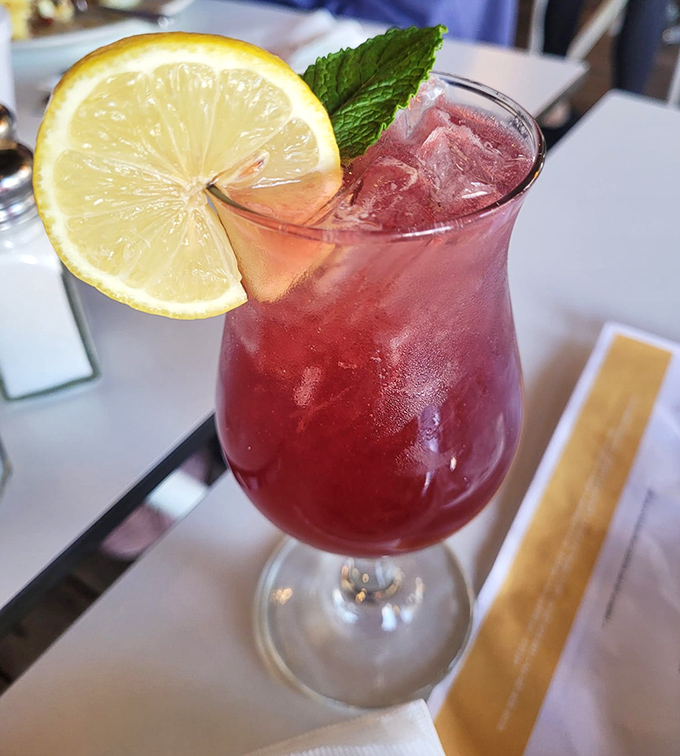 This isn't just any pink lemonade&mdash;it's summer in a glass, complete with a slice of sunshine and enough ice to cool your Florida fever.