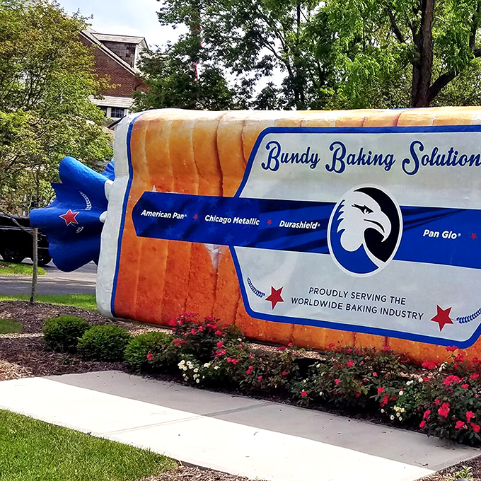 Flowers bloom where bread is planted. The seasonal landscaping changes around this quirky landmark make it worth revisiting throughout the year.