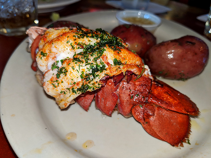 A perfectly broiled lobster tail with herb butter and red potatoes &ndash; proof that sometimes the simplest preparations let great ingredients shine brightest.