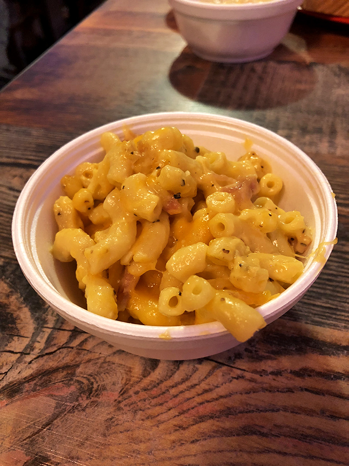 Mac and cheese that achieves the impossible balance: creamy enough to comfort, structured enough to respect itself on the plate.