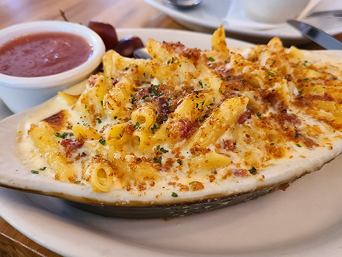 Mac and cheese that would make your Italian grandmother nod in approval while simultaneously making your cardiologist nervously clear their throat. 