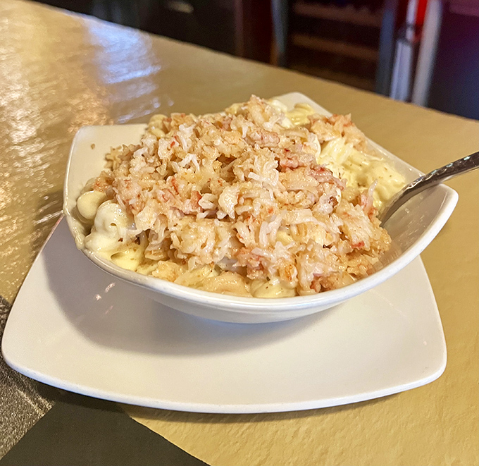 Mac and cheese that's dressed for a gala, topped with crispy breadcrumbs like a tuxedo jacket on prom night.