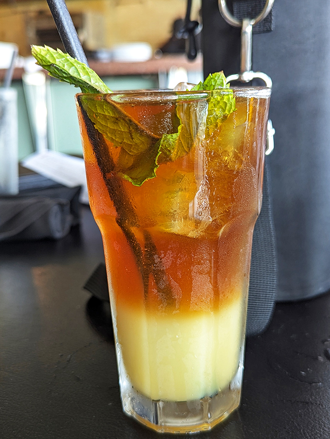 The Mai Tai arrives in layers like a California sunset, promising tropical escape with each sip&mdash;no passport or sunscreen required.